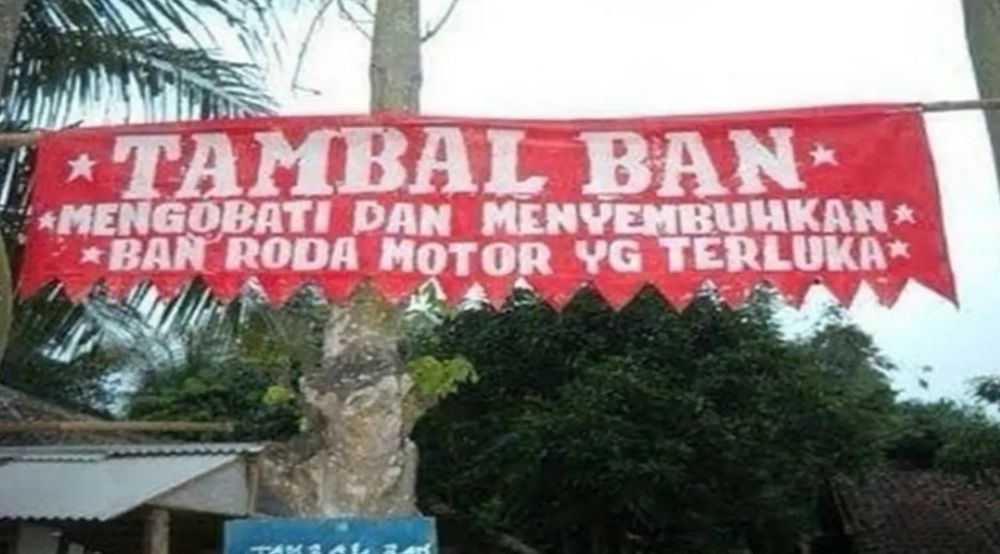 10 Spanduk Promosi Kocak Tukang Tambal Ban Ini Bikin Ketawa