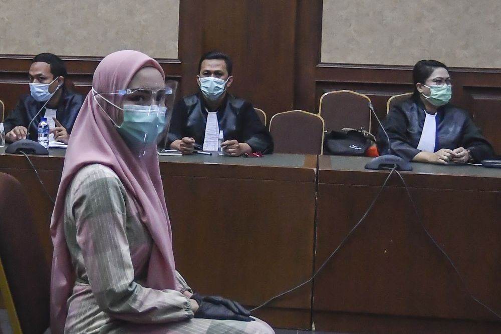 [FOTO] Jaksa Pinangki Tampil Serba Pink di Sidang Perdana Kasus Suap